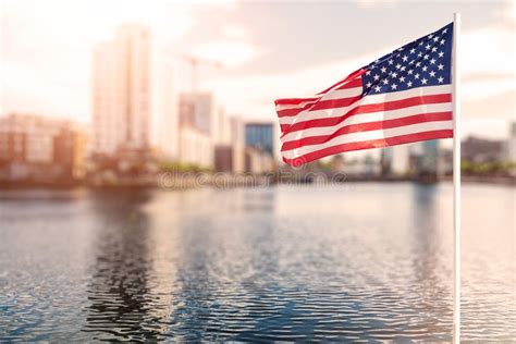 Waving Flag Of United States Of America Against Dramatic Red Blood