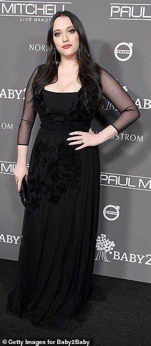Kat Dennings Puts On Very Busty Show In Low Cut Black Dress At