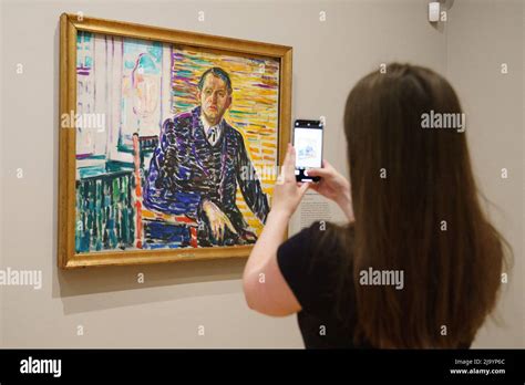 A Visitor Takes A Photo Of Self Portrait In The Clinic During A