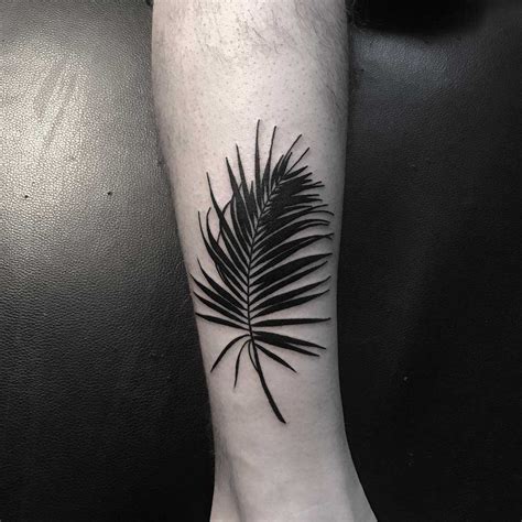 Black Feather Tattoo By Johnny Gloom Tattoogrid Net