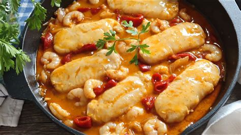 Receta de Merluza a la bilbaína con pimientos rojos