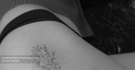 Fine Line Style Flower Bouquet Tattoo Located On The