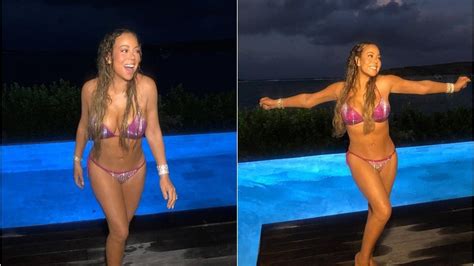 Aos 48 anos Mariah Carey promove momento raro ao posar de biquíni e