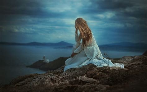 A Sad Girl Sitting Alone Wallpaper