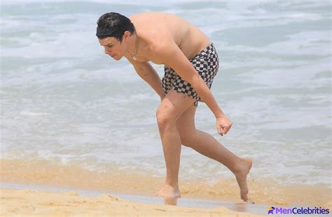 Yungblud Flaunts His Bare Chest On The Beach And May Be Celebrating Her