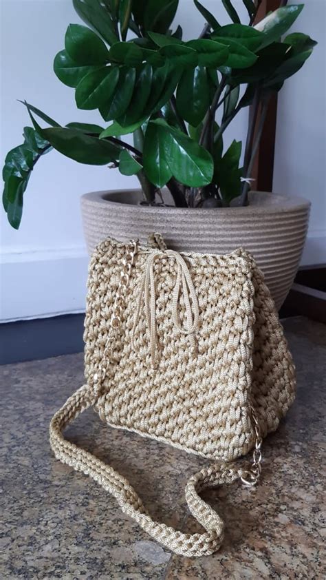 Linda bolsa de crochê em fio náutico dourado Elo7