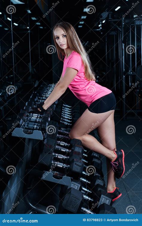 Blonde Fitness Woman In Sportswear With Perfect Body Posing In The Gym Attractive Sporty Girl