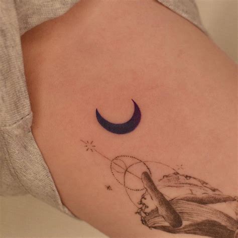 Minimalist Crescent Moon Tattoo On The Inner Forearm