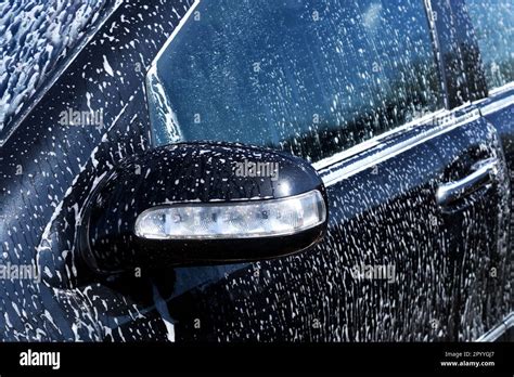Washing Black Car With White Soap Foam Cleaning Auto Car Wash Auto
