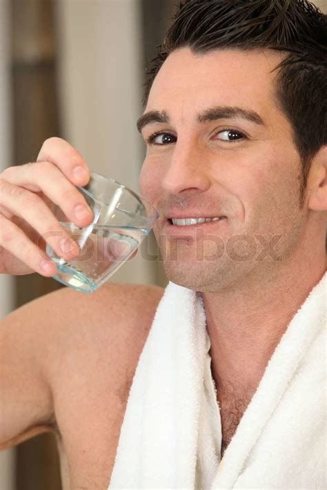Naked Man Drinking A Glass Of Water Stock Image Colourbox