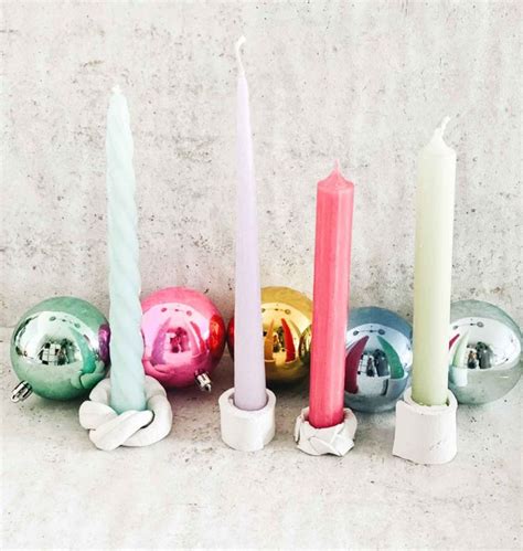 Some Candles Are Lined Up Next To Each Other