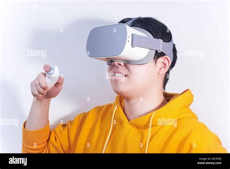 People Wearing Glasses Playing Vr Virtual Reality With A Handle Stock