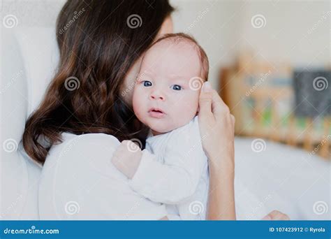 Portrait Of A Newborn In His Mother S Arms Stock Photo Image Of Cute