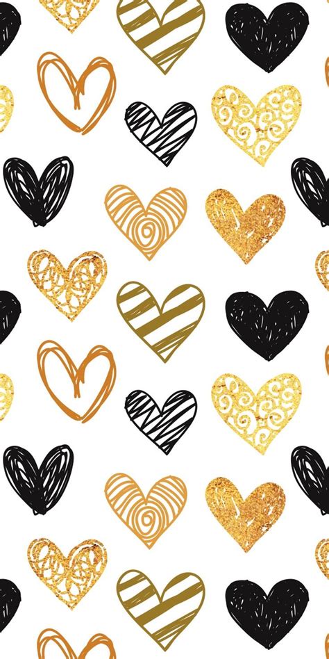 Gold And Black Hearts Are Arranged In The Shape Of Heart Shapes On A