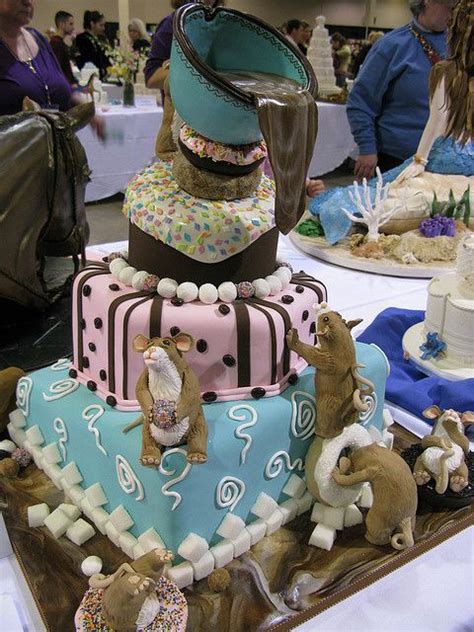 A Large Multi Layer Cake Sitting On Top Of A Table