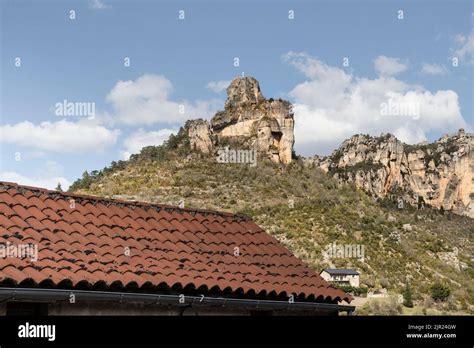 The Rocher De Capluc With Its White Summit Cross Viewed From Le Rozier