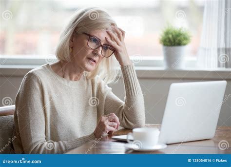 Confused Mature Woman Thinking About Online Problem Looking At L Stock