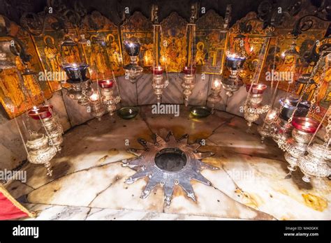 A Silver Star Marks The Traditional Site Of The Birth Of Jesus In A