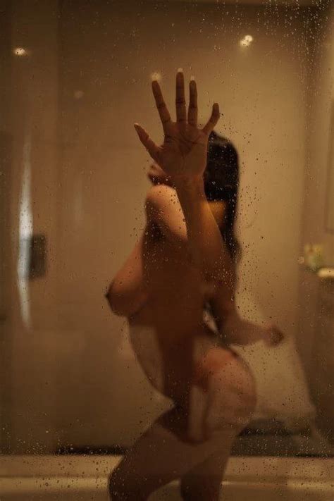 Passionate Topless Desi Model Poses With Her Hands On The Bathroom