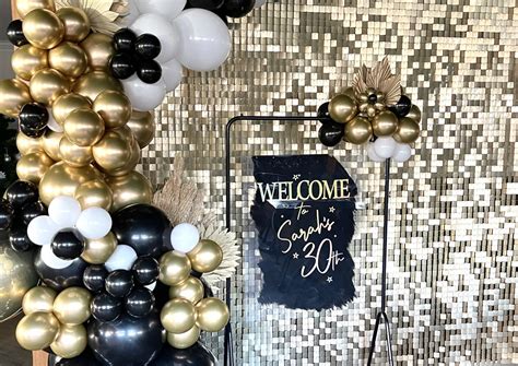 Sequin Wall With Organic Balloon Garland Tantrum Events