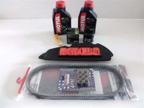 KIT TAGLIANDO OLIO FILTRO OLIO ARIA CANDELA CINGHIA RULLI Per HONDA SH