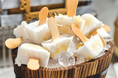 Cómo hacer Paletas heladas de piña y coco Receta Receta Paletas