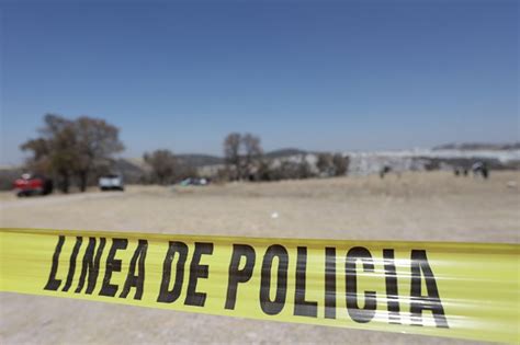 En terreno baldío al sur de Puebla localizan cuerpo sin vida de una