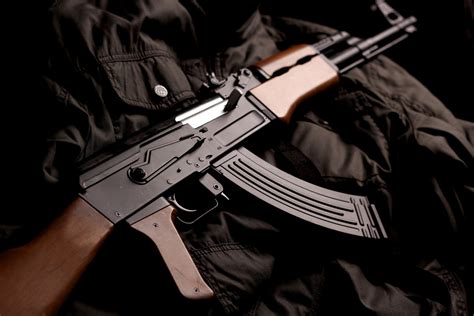 Stunning 4K Ultra HD Wallpaper Of A Man Made AK 47