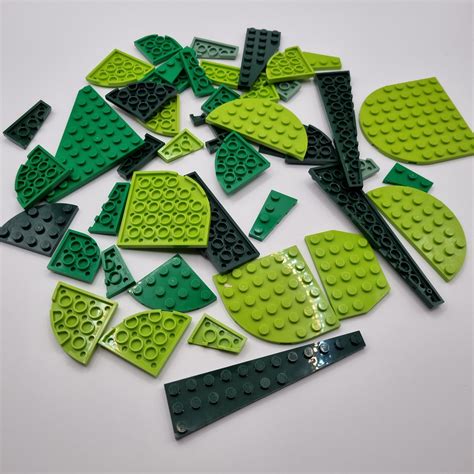 Se produkter som liknar LEGO blandade gröna plattor på Tradera
