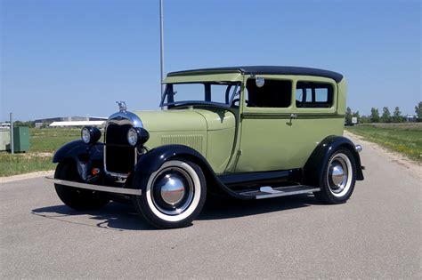 1928 FORD MODEL A CUSTOM TUDOR SEDAN Front 3 4 210314
