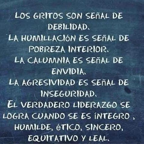 A Blackboard With Some Writing On It In Spanish And English Along With