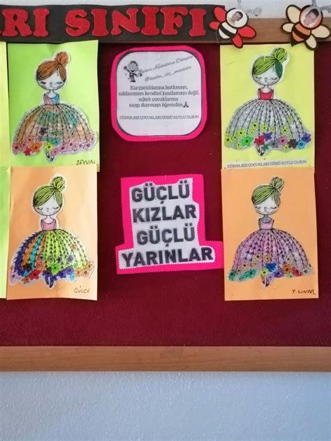 The Bulletin Board Is Decorated With Colorful Pictures