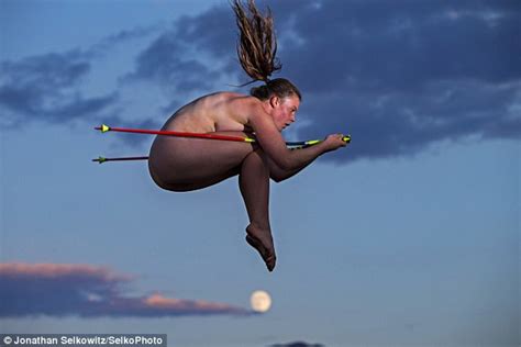 Brave Ski Racers Are Pictured Hurtling Down Snowy Slopes Completely