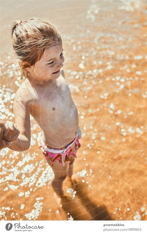 Happy Man Riding Bike On Beach A Royalty Free Stock Photo From Photocase
