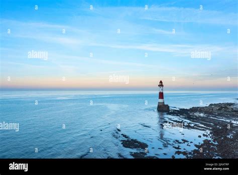 Beautiful Summer Sunrise Landscape Image Of Beachy Head Lighthouse In