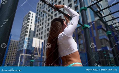 Asian Beautiful Lady Is Training On Open Sporty Area At Summer Day Closeup View On Her Buttocks