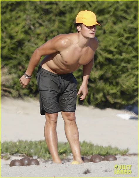Orlando Bloom Looks Ripped While Shirtless On Malibu Beach Photo