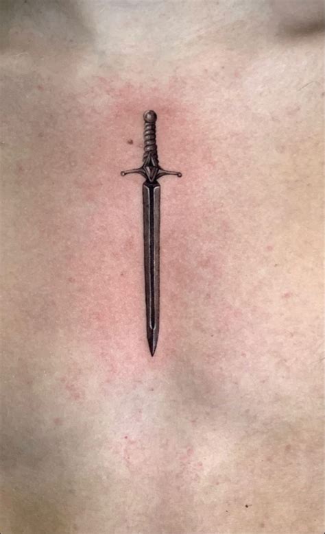 Sword Chest Tattoo In 2022 Sword Tattoo Small Tattoos For Guys V Tattoo