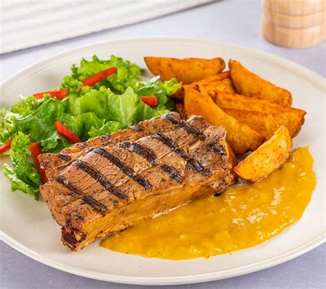 Costilla de cerdo a la parrilla en salsa de maracuyá