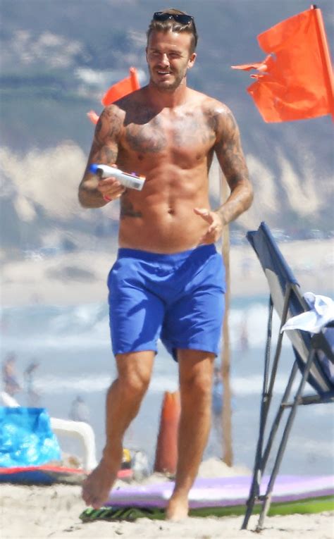 Shirtless David Beckham Flaunts Rock Hard Abs On The Beachsee The Hot