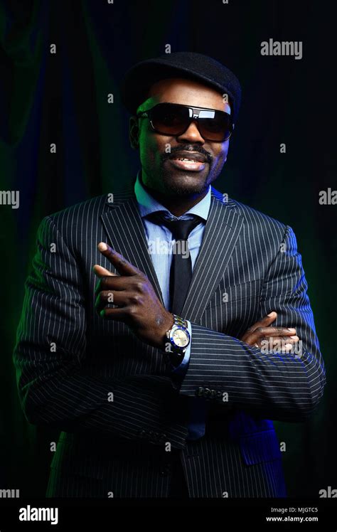 Black Man In Suit And Hat