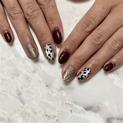 秋 冬 ハンド ラメ アニマル柄 Mami private nail salon Fika のネイルデザイン No 8618152