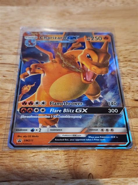 Pokémon TCG Charizard GX SM Black Star Promo SM211 Holo Promo Card