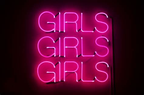 Girls Girls Girls Sign Glows In Racy Pink Neon Against Dark Night Background Fubiz Media