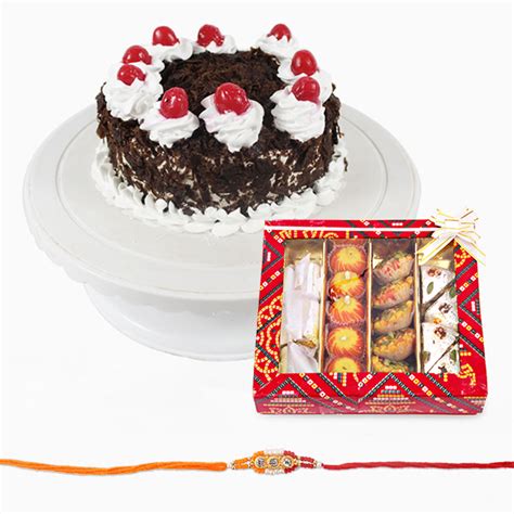 Black Forest Cake With Sweets And Rakhi Best Price Giftacrossindia