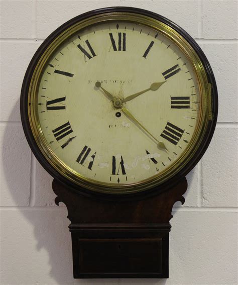 An Early Th Century Large Mahogany Circular Drop Dial Wall Timepiece