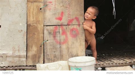 Naked Baby Crying In Shack Stock Video Footage 1099725