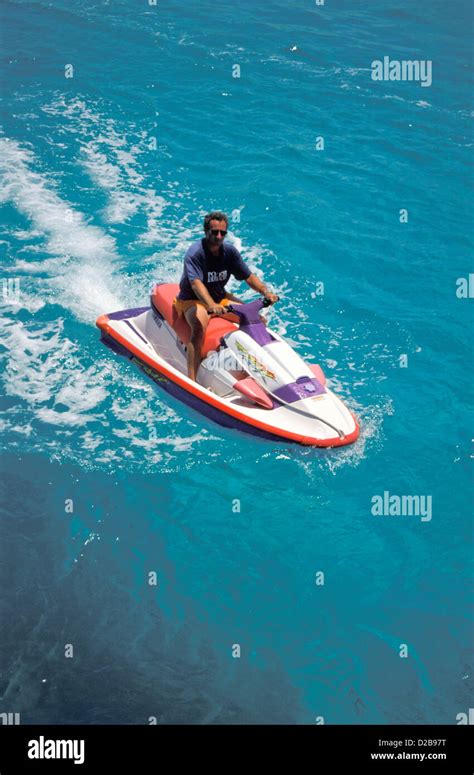 A Man Riding A Jet Ski Stock Photo Alamy