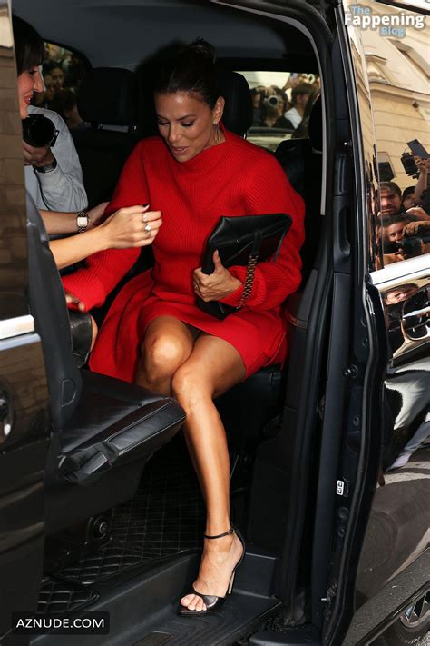 Eva Longoria Flaunts Her Sexy Legs At Paris Fashion Week Aznude