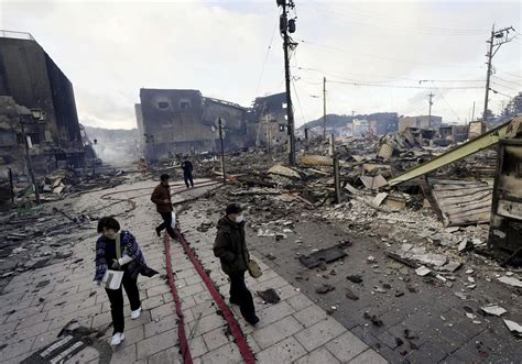 Powerful Earthquakes Leave At Least Dead Destroy Buildings Along
